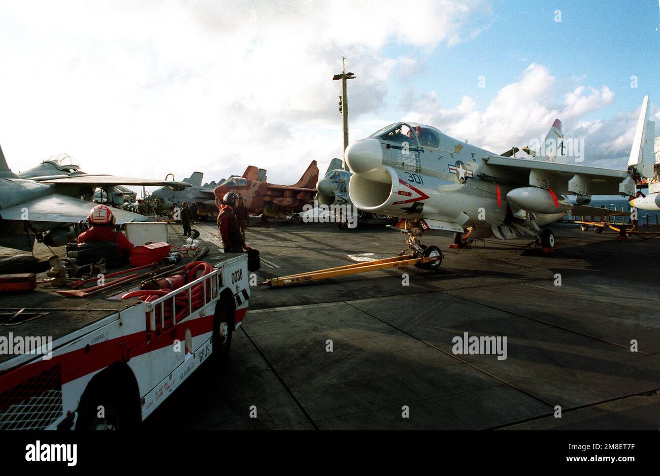 An A-7E Corsair aircraft, right, assigned to the commander of Attack ...
