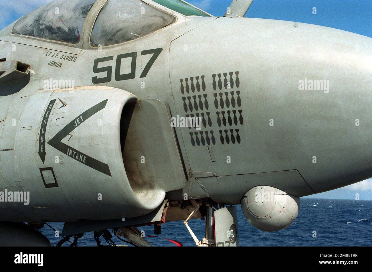 A close-up view of the markings on the nose of an Attack Squadron 75 ...