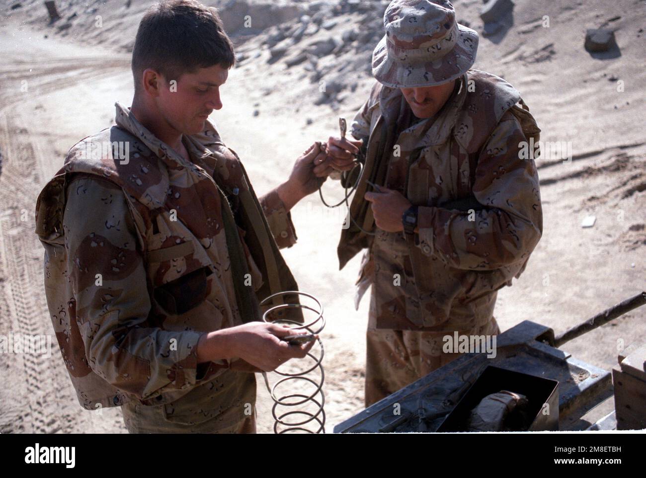 Members of a demolition team from Task Force Alpha, 2nd Marine Division ...