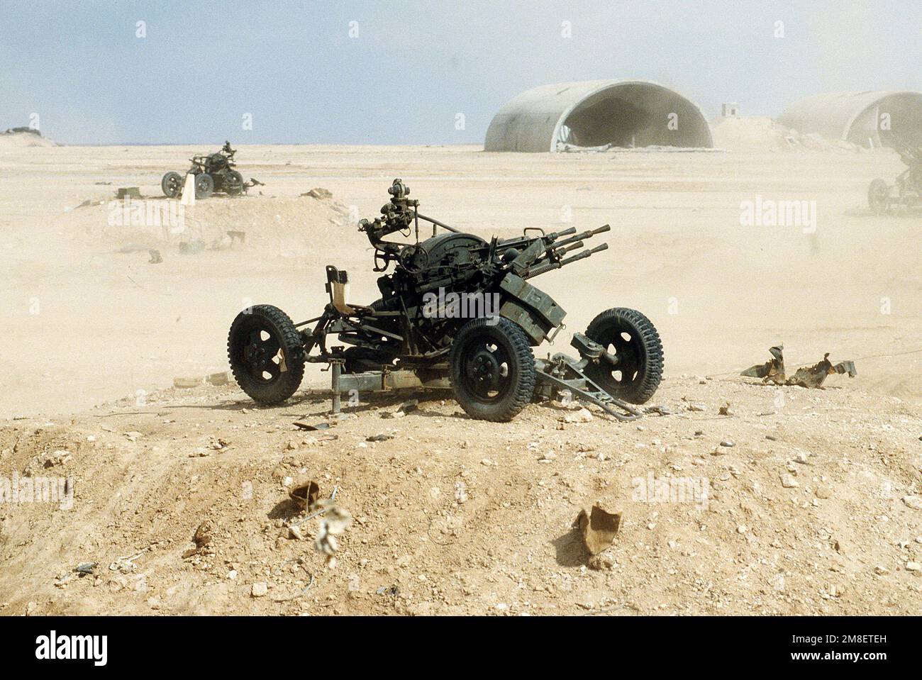 A Soviet-made ZPU-4 14.5mm anti-aircraft gun stands abandoned at Al ...