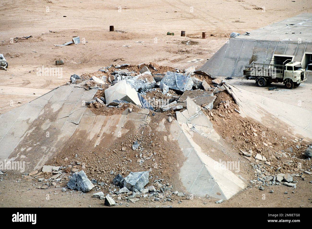 A view of a munitions bunker at Al-Salman Air Base destroyed by Allied ...