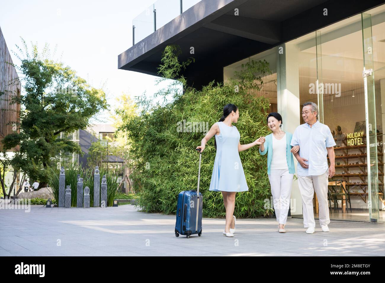 Three to go traveling Stock Photo - Alamy