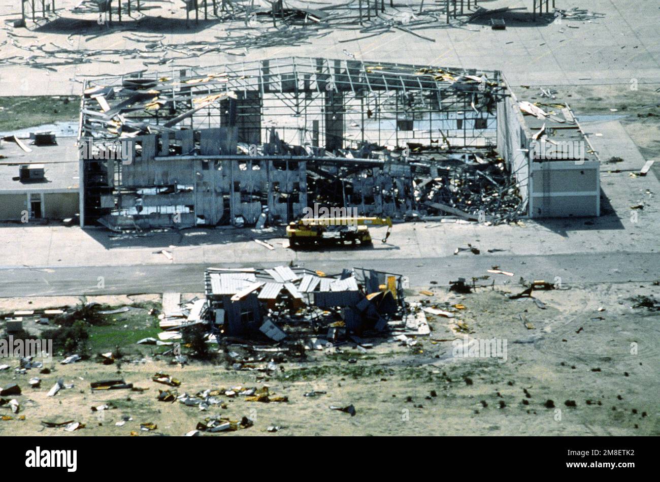 A view of a destroyed buildings at Kuwait International Airport after ...