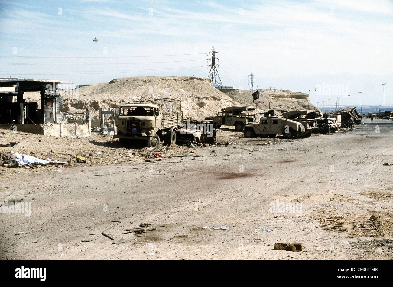 An M998 High-Mobility Multipurpose Wheeled Vehicle (HMMWV) and other U ...