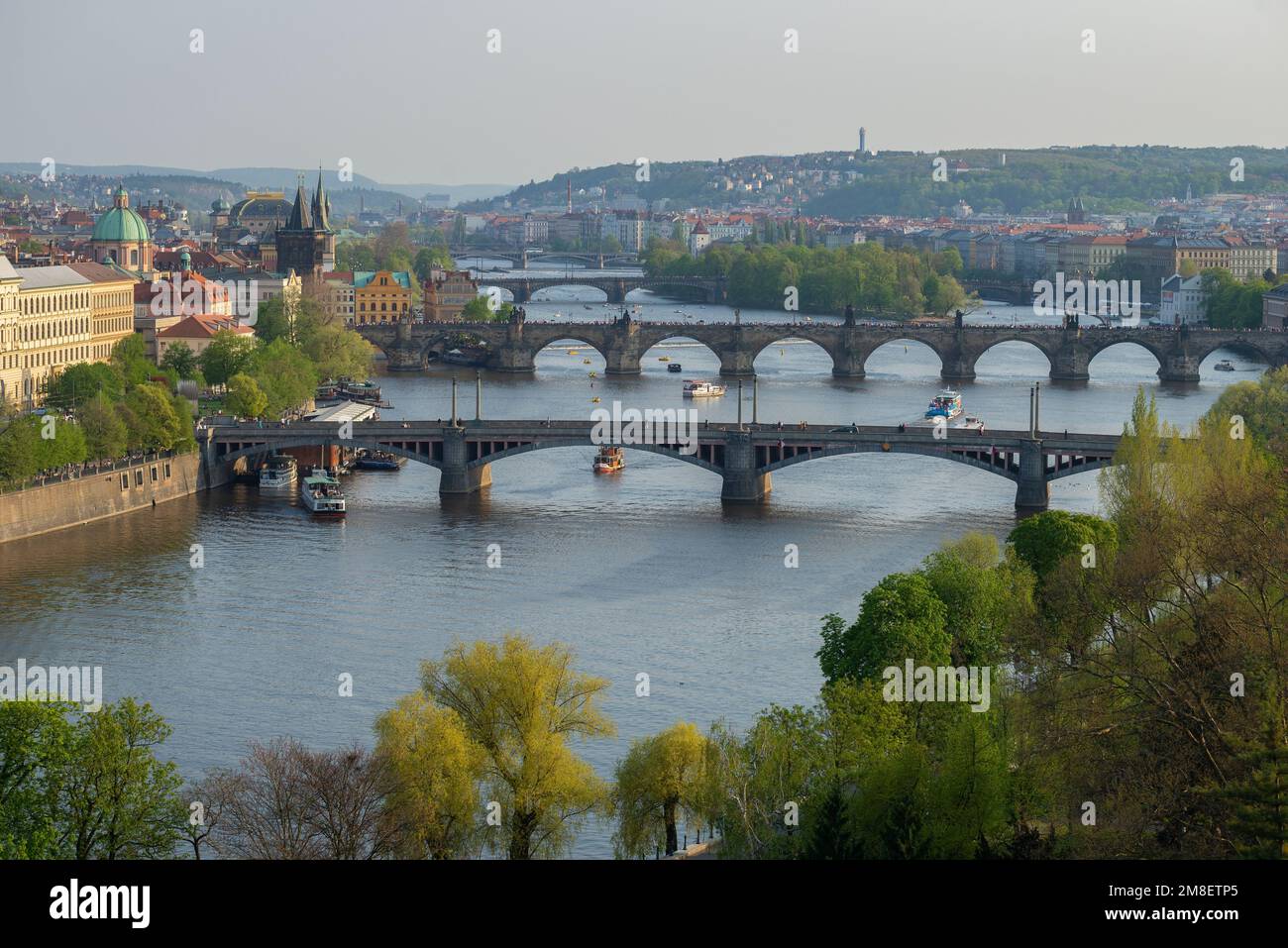 View of Prague bridges and Vltava river in April evening. Prague, Czech ...
