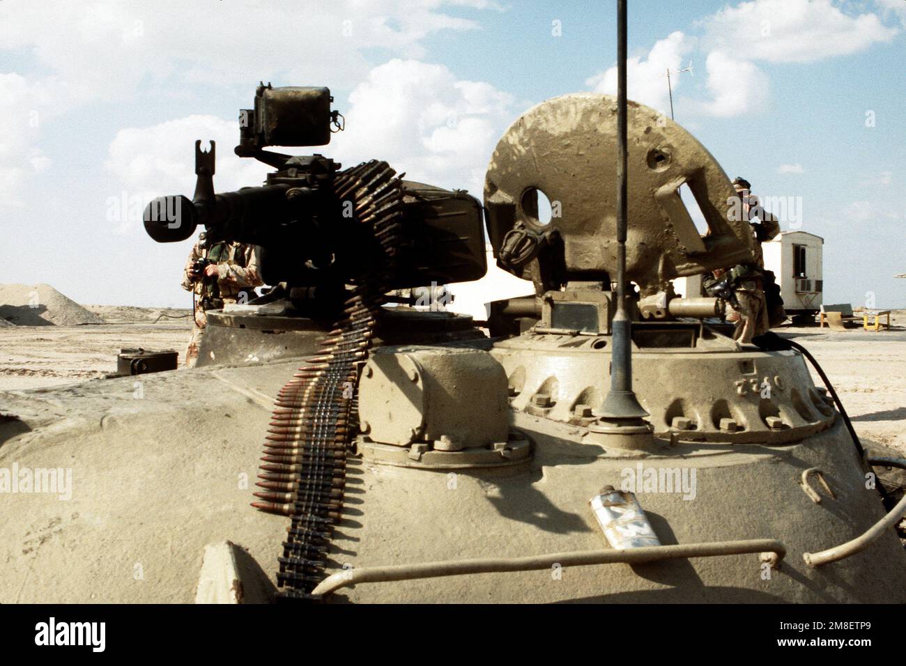 A close-up view of the 12.7mm Degtyarev DShKM heavy machine gun mounted ...