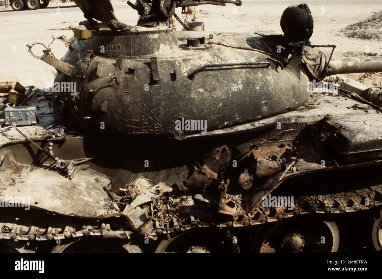 A close-up view of damage to an Iraqi T-55 main battle tank, one of ...