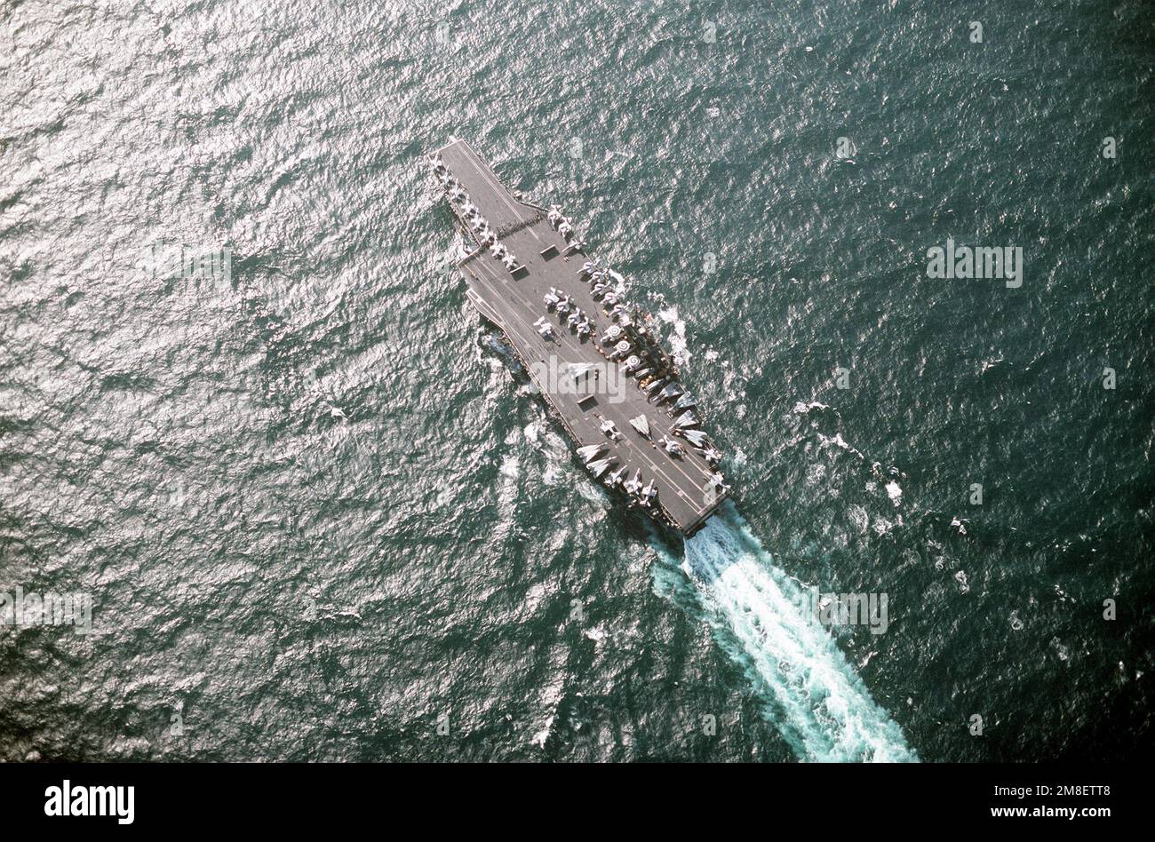 An overhead view of the aircraft carrier USS AMERICA (CV-66) as it ...