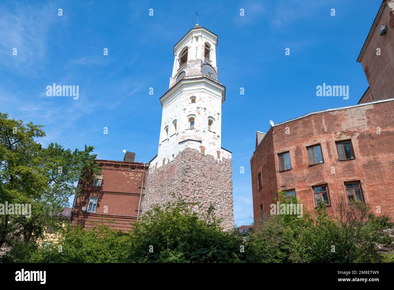 View of the ancient Clock Tower on a sunny summer day. Vyborg ...