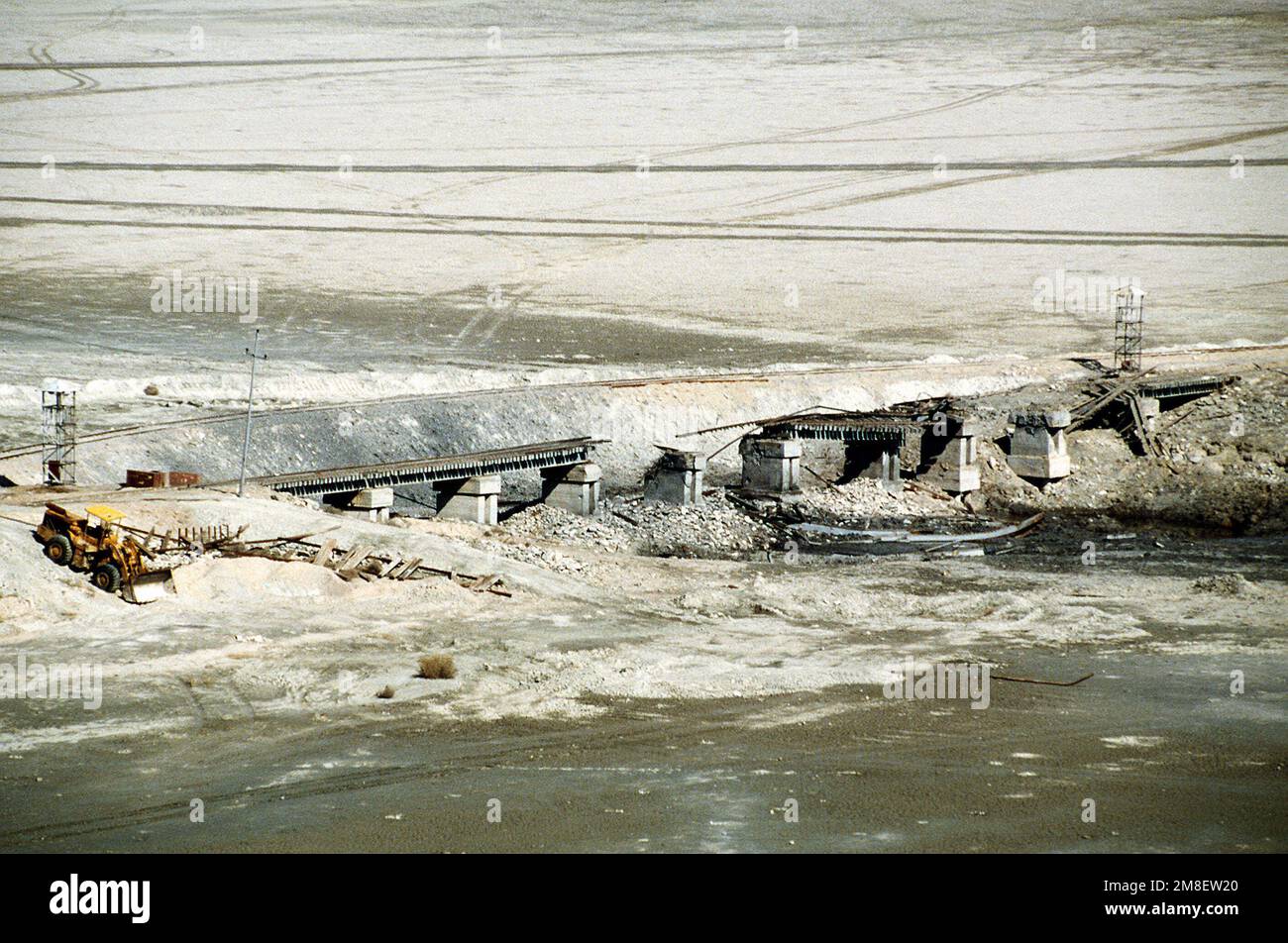 A railroad bridge near the Arramaylan refinery damaged by Allied ...