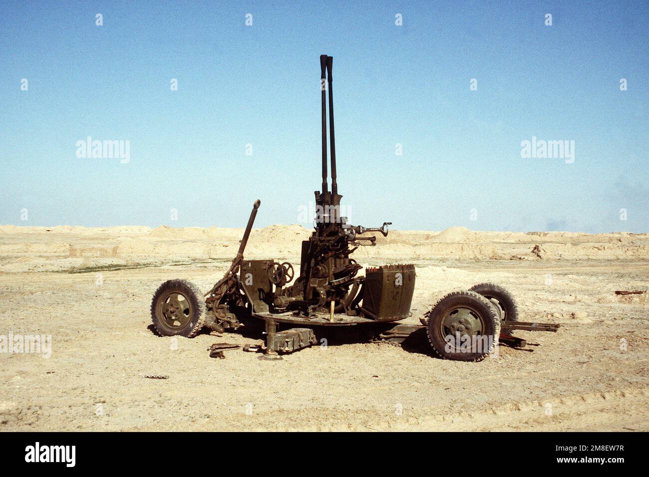 An M-1939 twin 37mm anti-aircraft cannon abandoned by the Iraqi ...