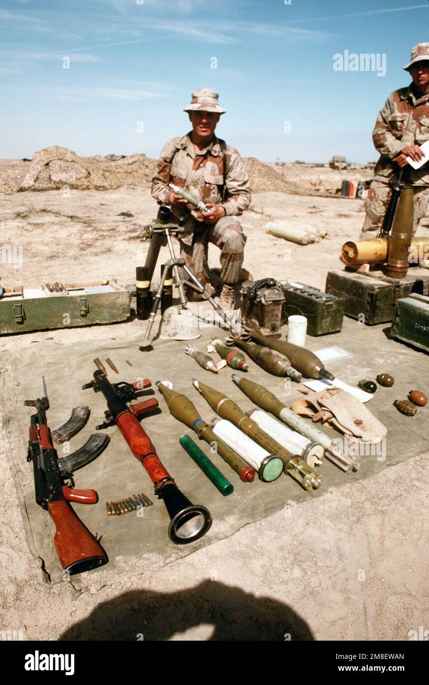A Marine non-commissioned officer from the 1ST Marine Division kneels ...