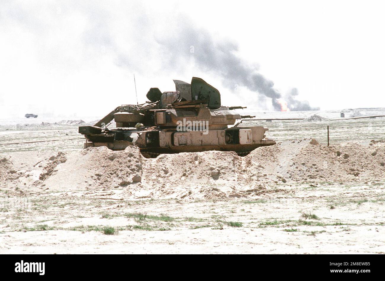 An abandoned Iraqi ZSU-23-4 self-propelled anti-aircraft gun sits in ...