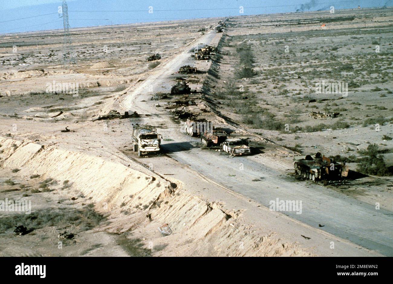 An Iraqi armored column, stretching to the horizon, destroyed in the ...