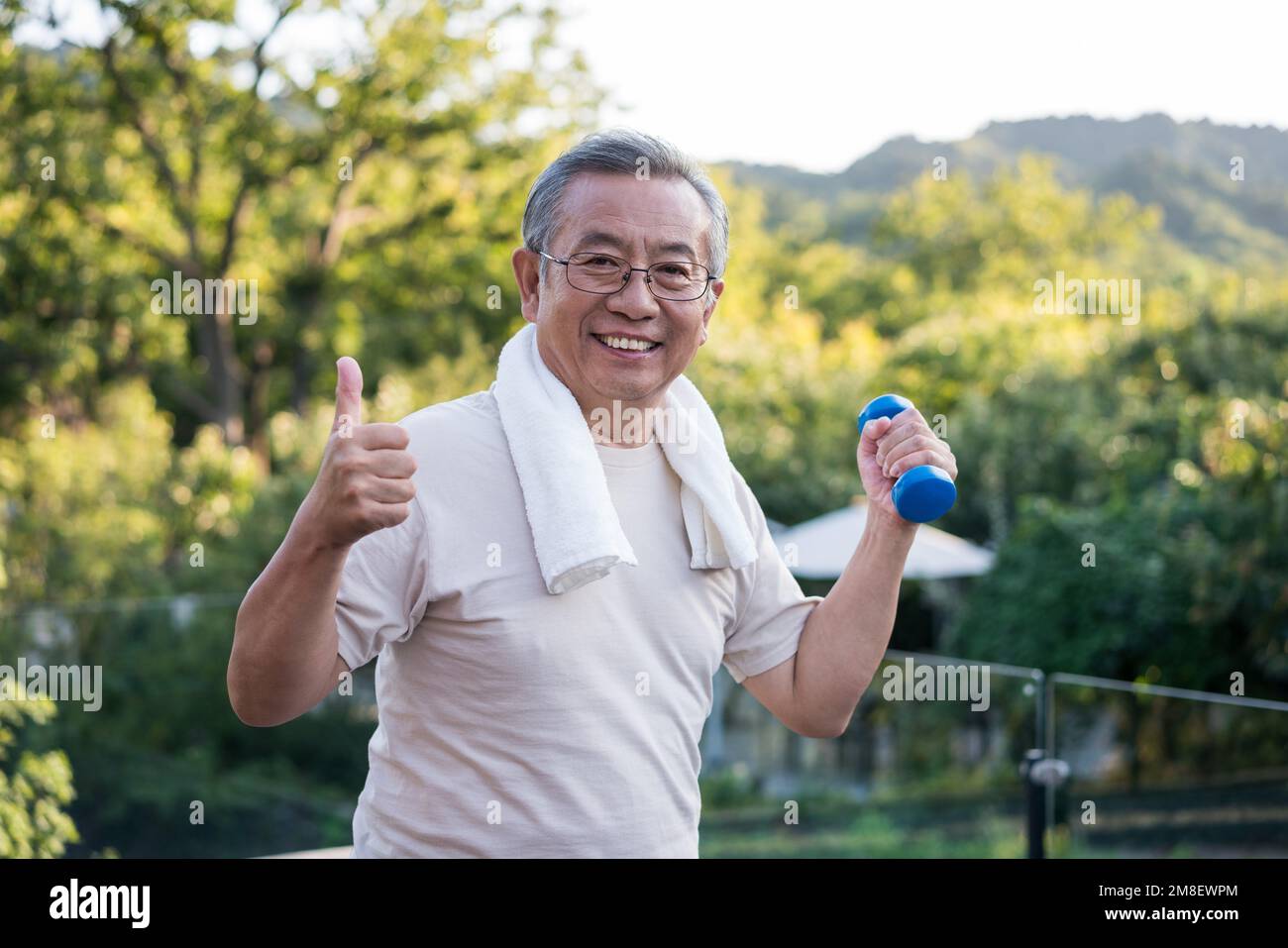 An old man in the exercise Stock Photo - Alamy