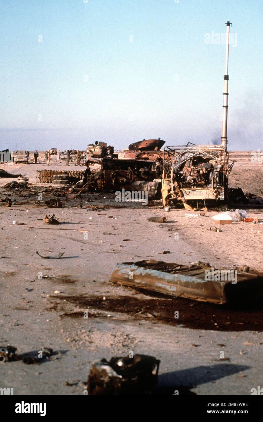 Demolished Iraqi equipment lies on a roadway in the Euphrates River ...