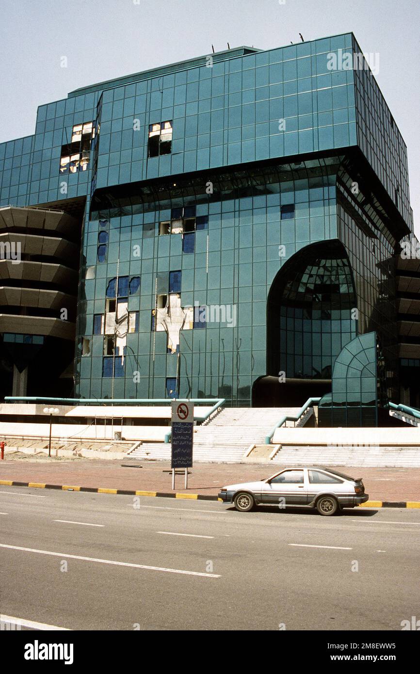 A view of battle damage to a building in Kuwait City during Operation ...