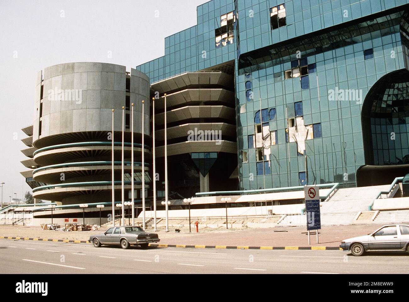 A view of battle damage to a building in Kuwait City during Operation ...