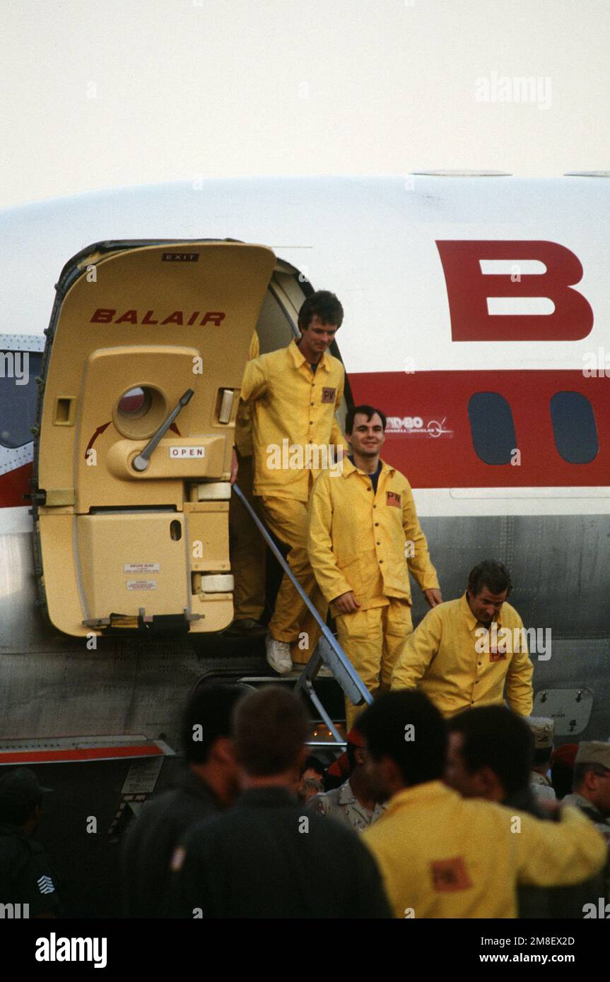 Former prisoners of war released by the Iraqi government disembark an ...
