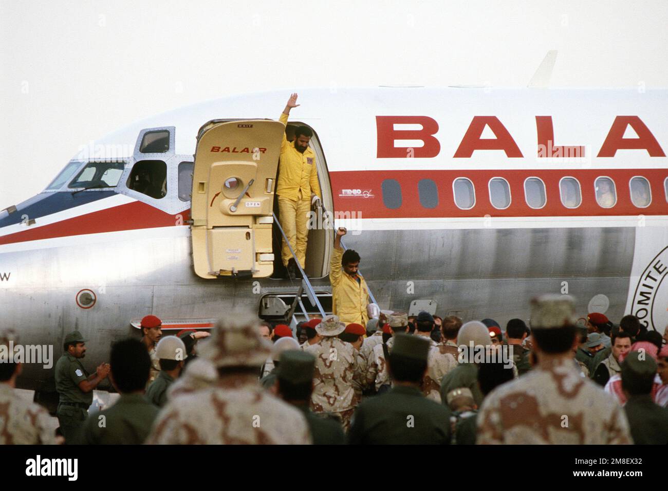 Former prisoners of war released by the Iraqi government disembark an ...