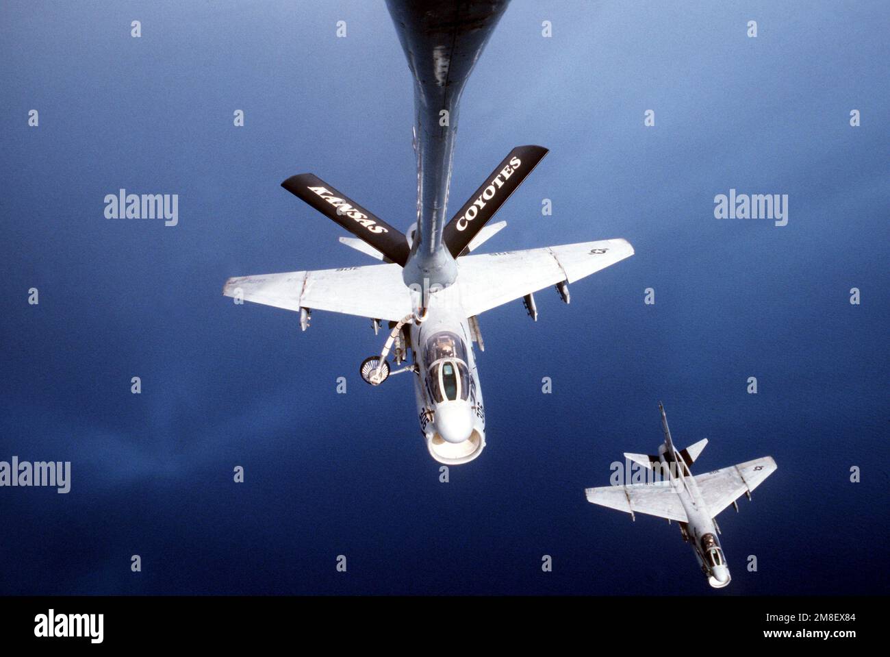 An Attack Squadron 46 (VA-46) A-7E Corsair aircraft receives fuel from ...