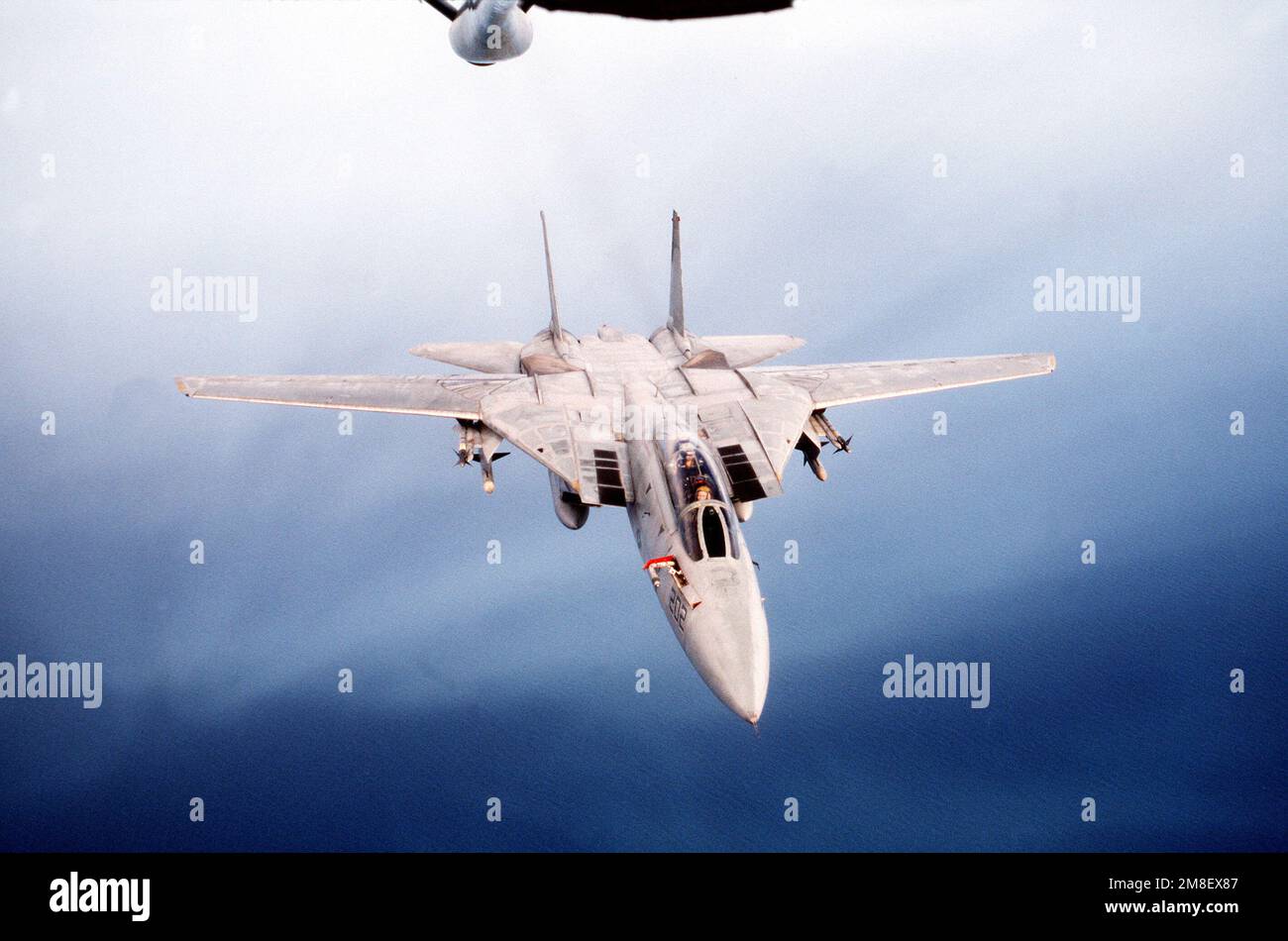 An F-14A Tomcat aircraft from Fighter Squadron 32 (VF-32) extends its ...