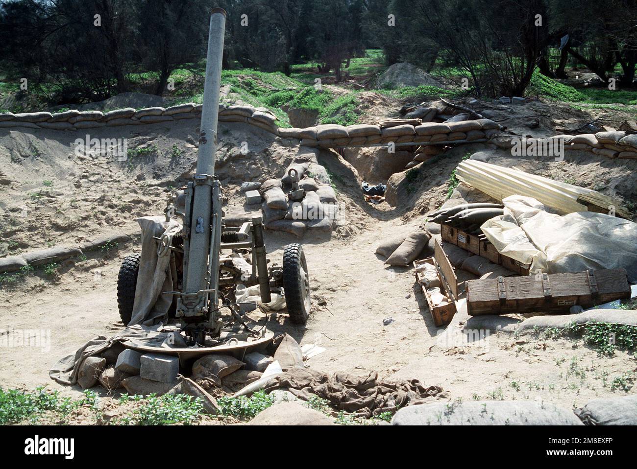 An abandoned Iraqi M-160, 160mm mortar stands at an outpost after Iraqi ...