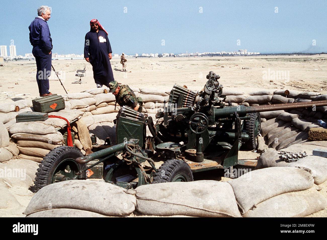 An Air Force sergeant examines an Iraqi M-1939 twin 37mm automatic anti ...