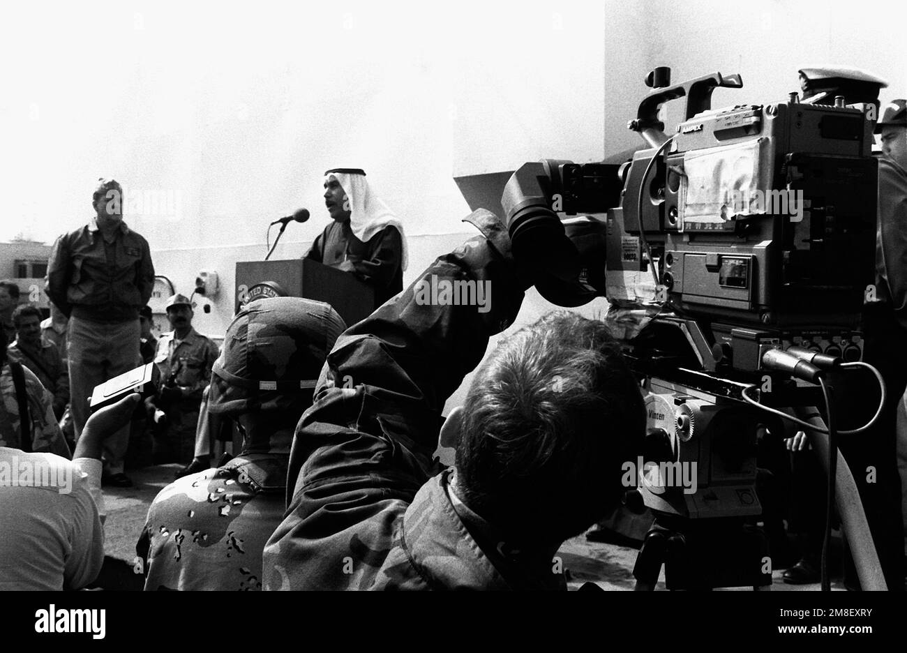 A cameraman films CAPT. Abdel-Rahman Naibari, Kuwaiti ports chief, as ...