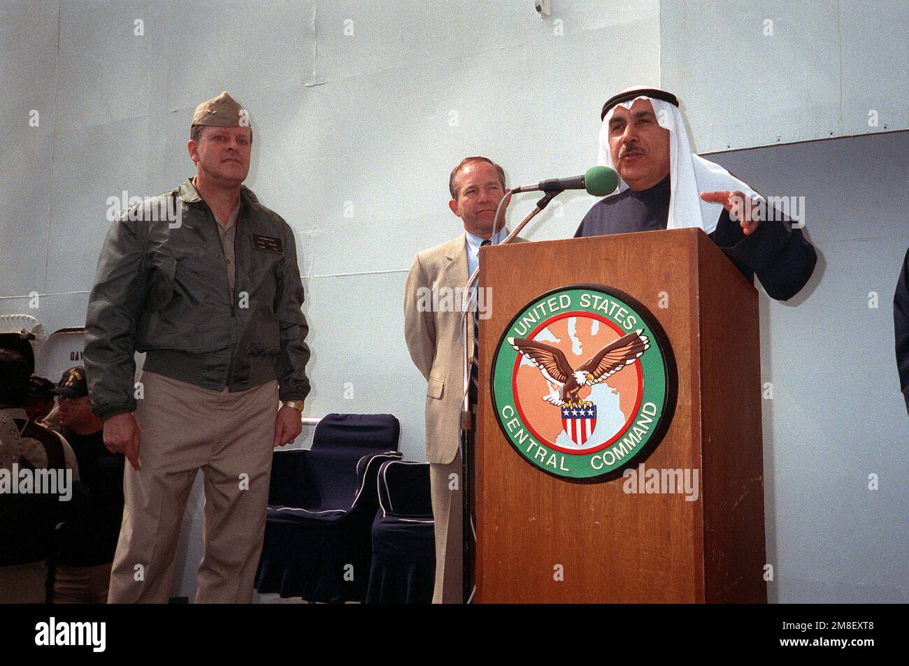 Rear Adm. Raynor A.K. Taylor, left, commander, U.S. Navy Middle East ...