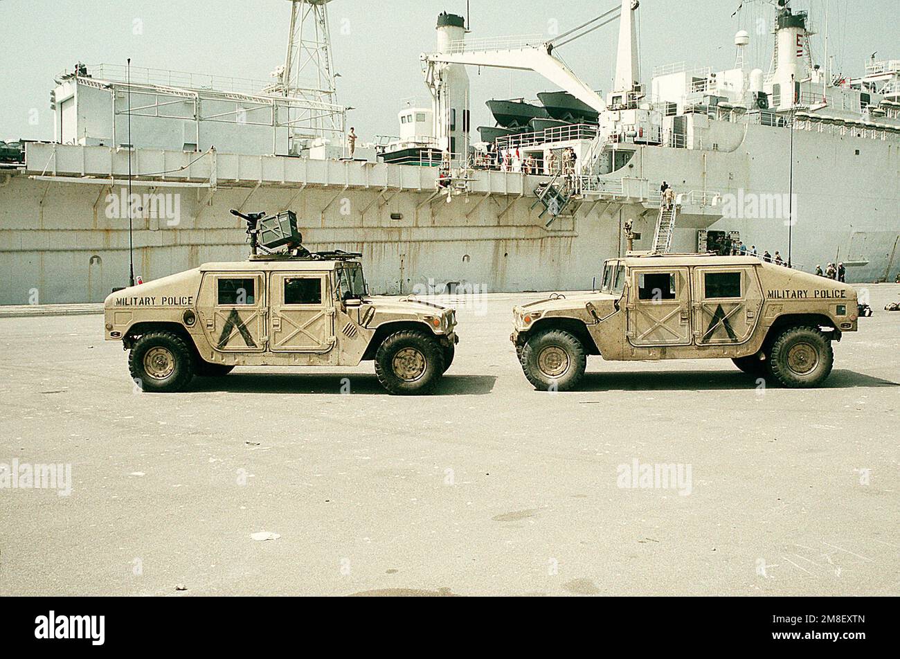 M998 High-Mobility Multipurpose Wheeled Vehicles (HMMWV) of a military ...