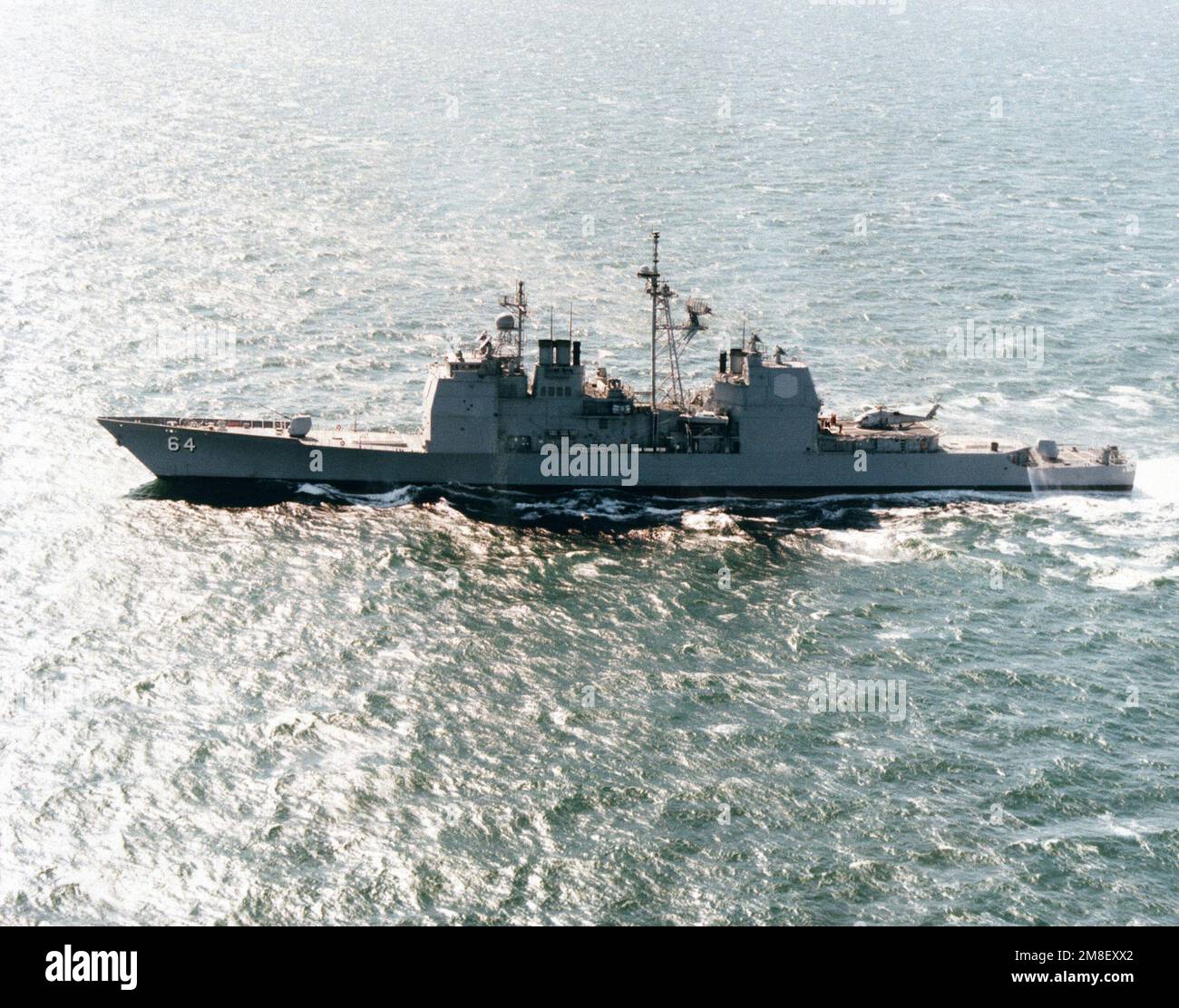 A port beam view of the guided missile cruiser USS GETTYSBURG (CG 64 ...