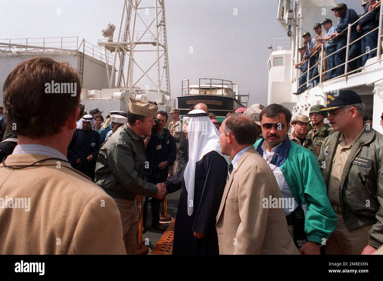 Rear Adm. Raynor A.K. Taylor, center left, commander, U.S. Navy Middle ...