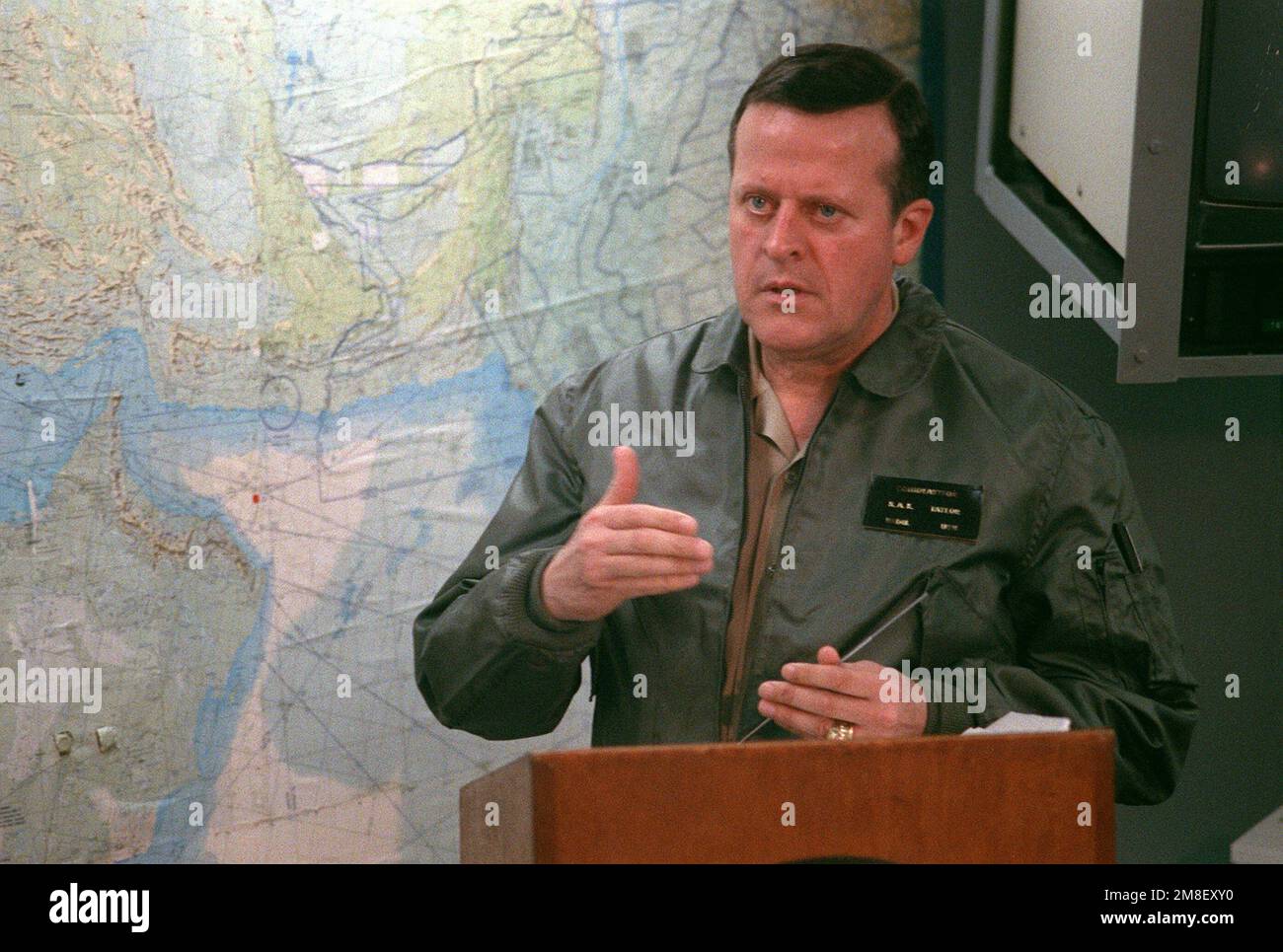 Rear Adm. Raynor A.K. Taylor, commander, Middle East Force, conducts a ...