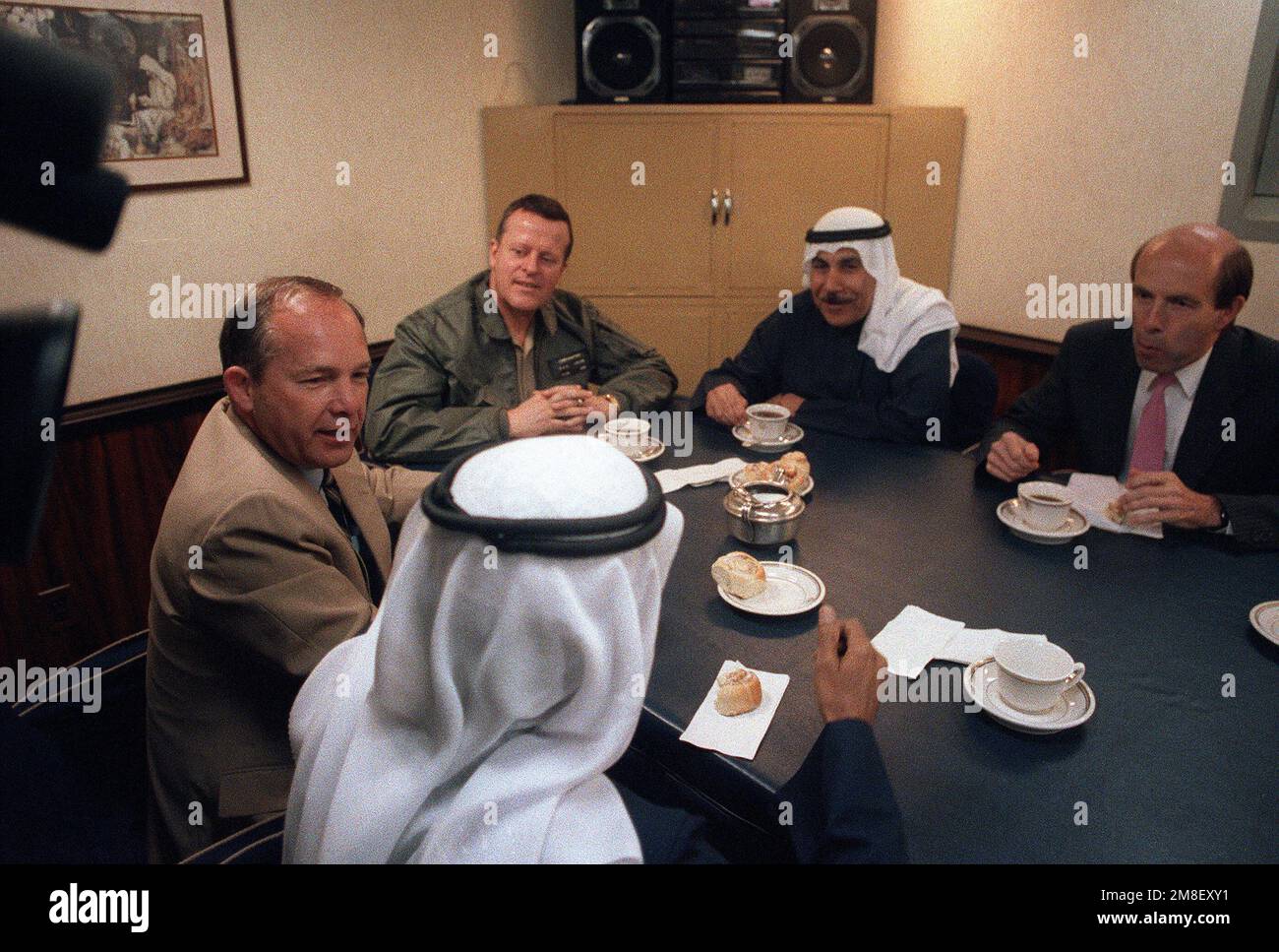 Dignitaries meet in the wardroom aboard the command ship USS LA SALLE ...