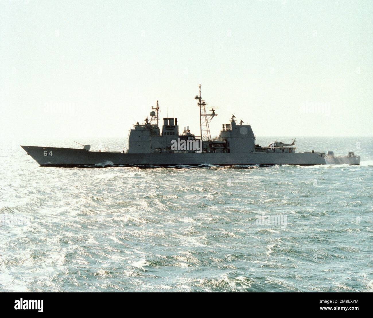 A port beam view of the guided missile cruiser USS GETTYSBURG (CG 64 ...
