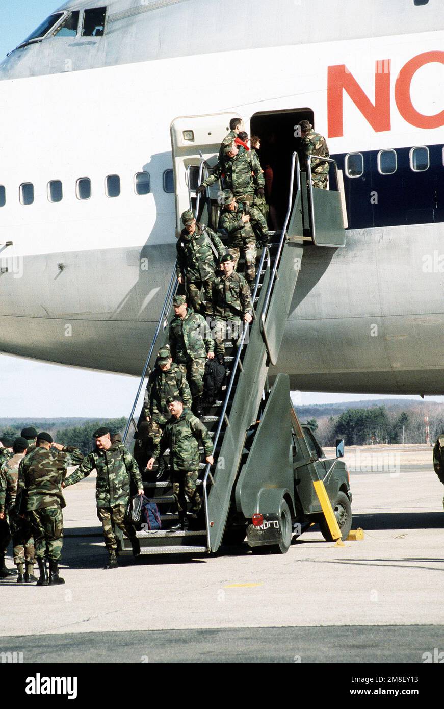 Members of the 10th Special Forces Group (Airborne) disembark from a ...