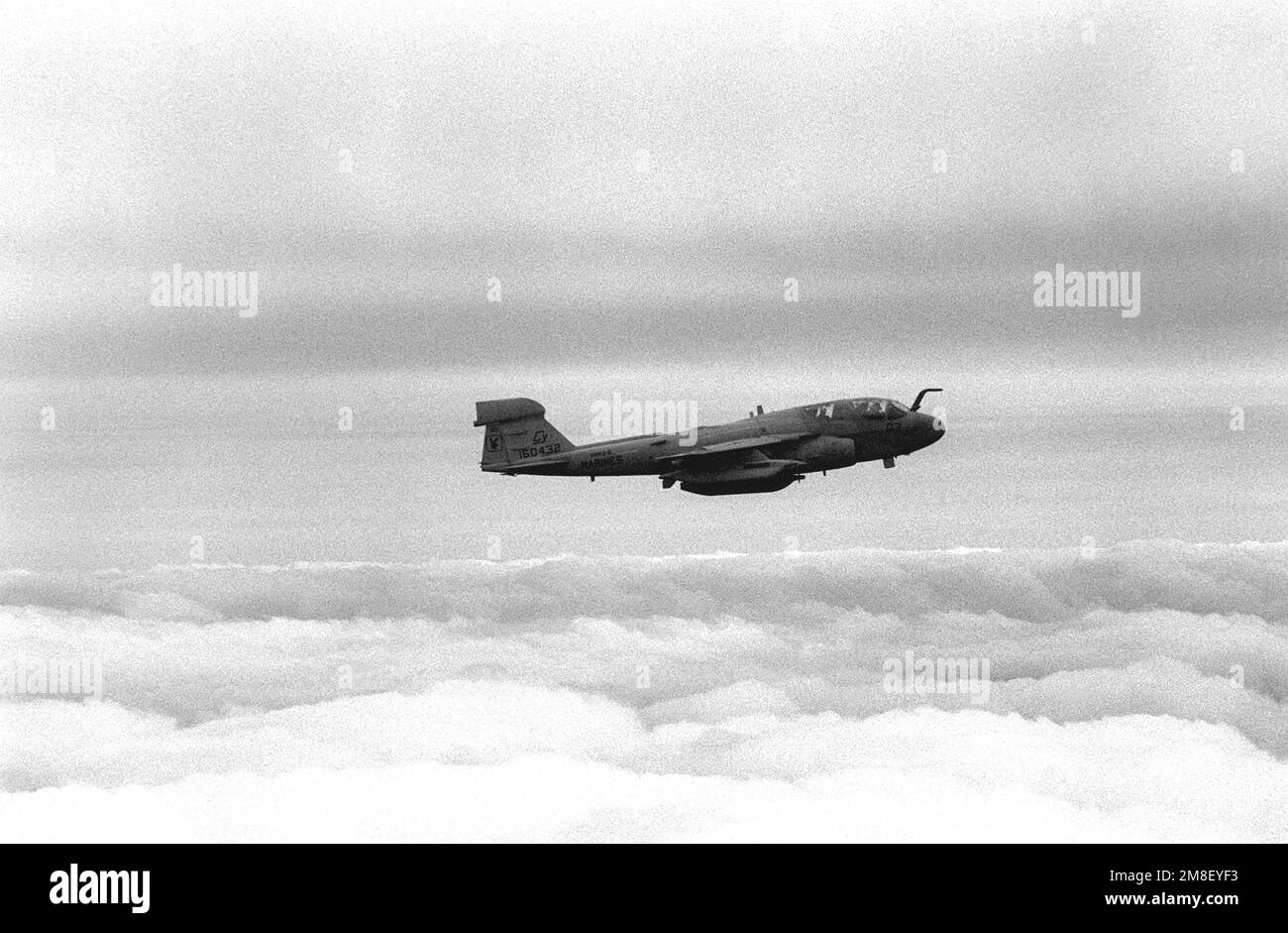 An air-to-air right side view of a Marine Tactical Electronic Warfare ...