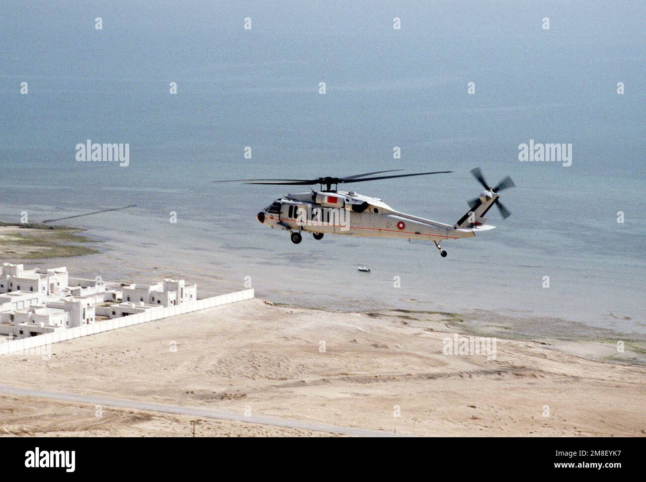 A UH-60 Black Hawk (Blackhawk) rescue helicopters from Bahrain flies ...