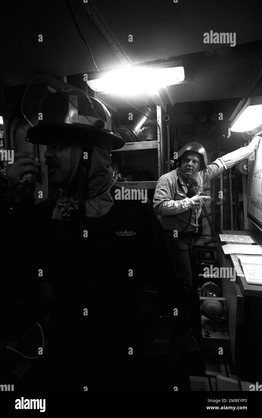 A sailor manning the No. 3 repair locker during a damage control drill ...