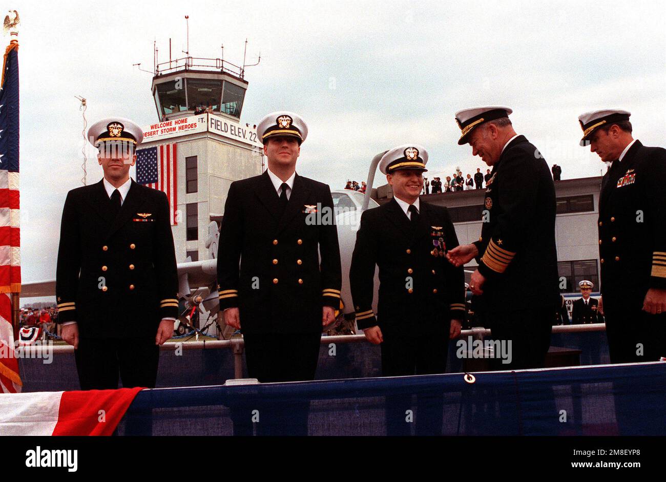 LT. Robert Wetzel, left, and LT. Jeffrey Zuan, third from left, stand ...