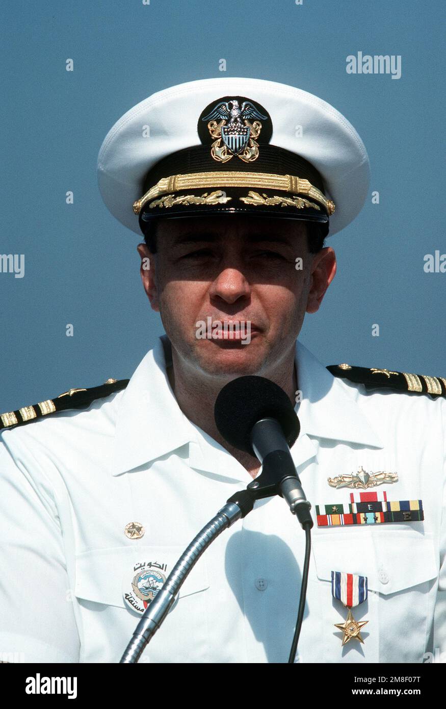 CMDR. Dennis G. Morral, commanding officer of the guided missile ...