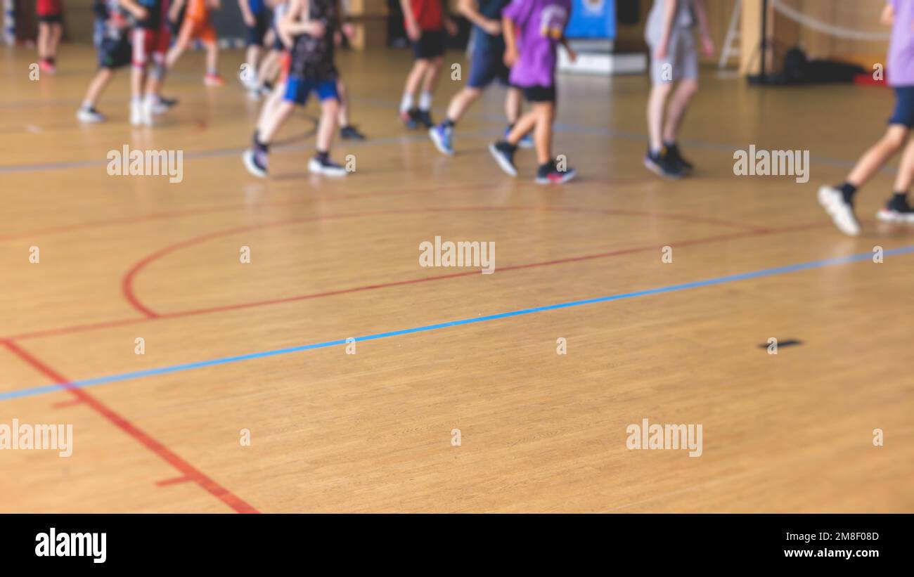 Kids playing basketball indoor hi-res stock photography and images - Alamy