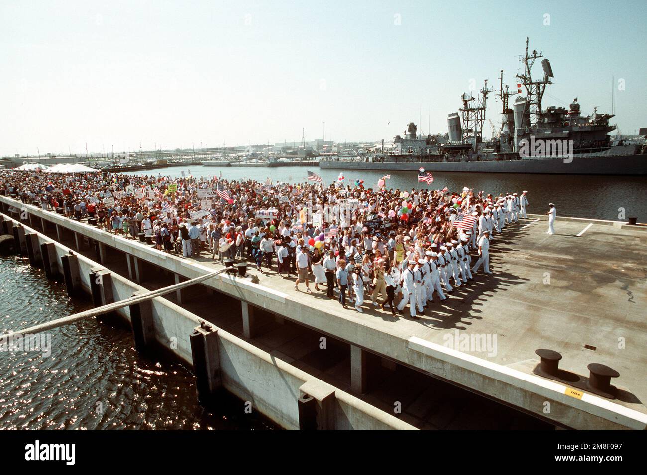 Family members and friends gathered to meet the guided missile ...