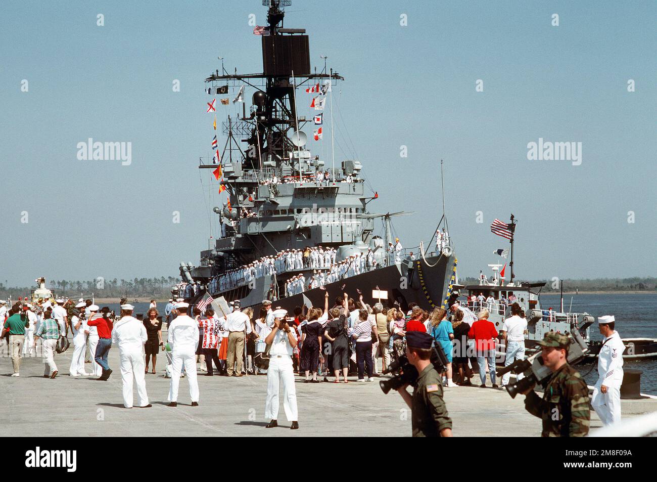 The crew of the guided missile destroyer USS MACDONOUGH (DDG-39) mans ...