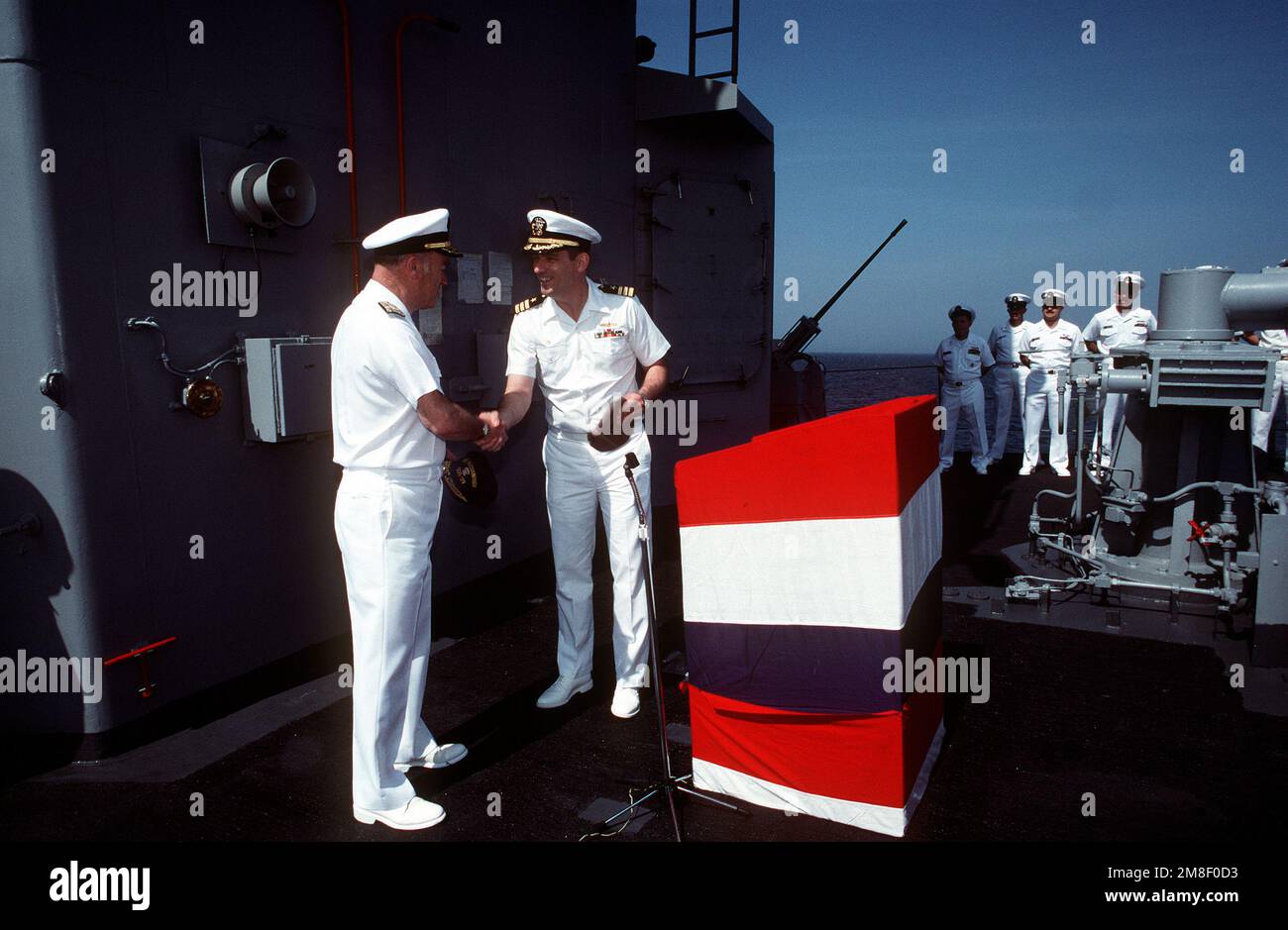 The commanding officer of the guided missile destroyer USS MACDONOUGH ...
