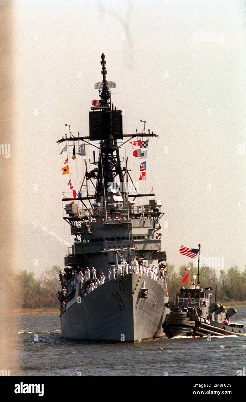 The large harbor tug ANTIGO (YTB-792) maneuvers the guided missile ...
