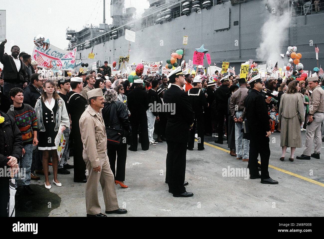 Family and friends of crew members aboard the destroyer tender USS ...