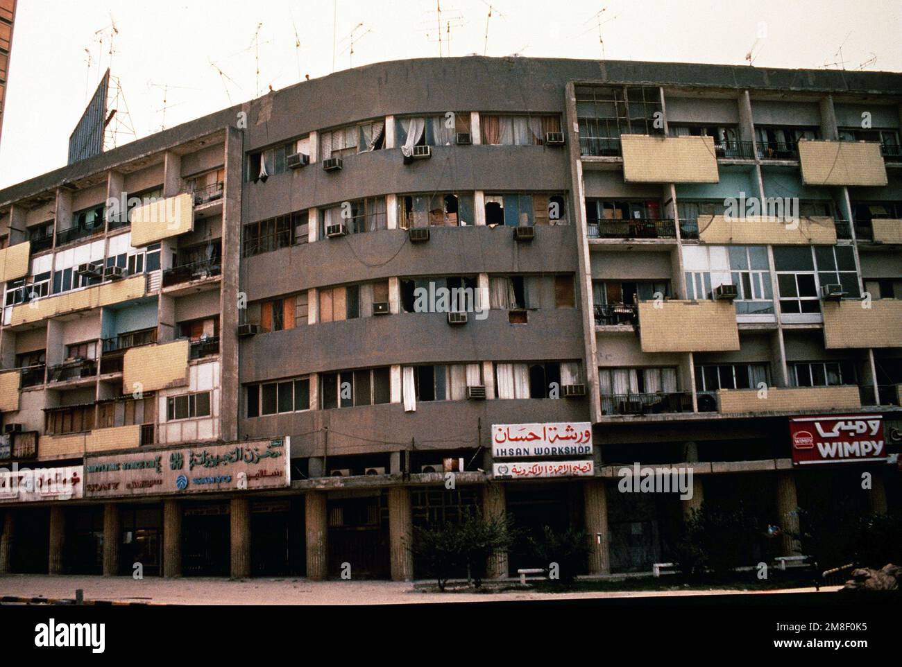 A damaged cuilding in Kuwait City after the Iraqi withdrawal during ...
