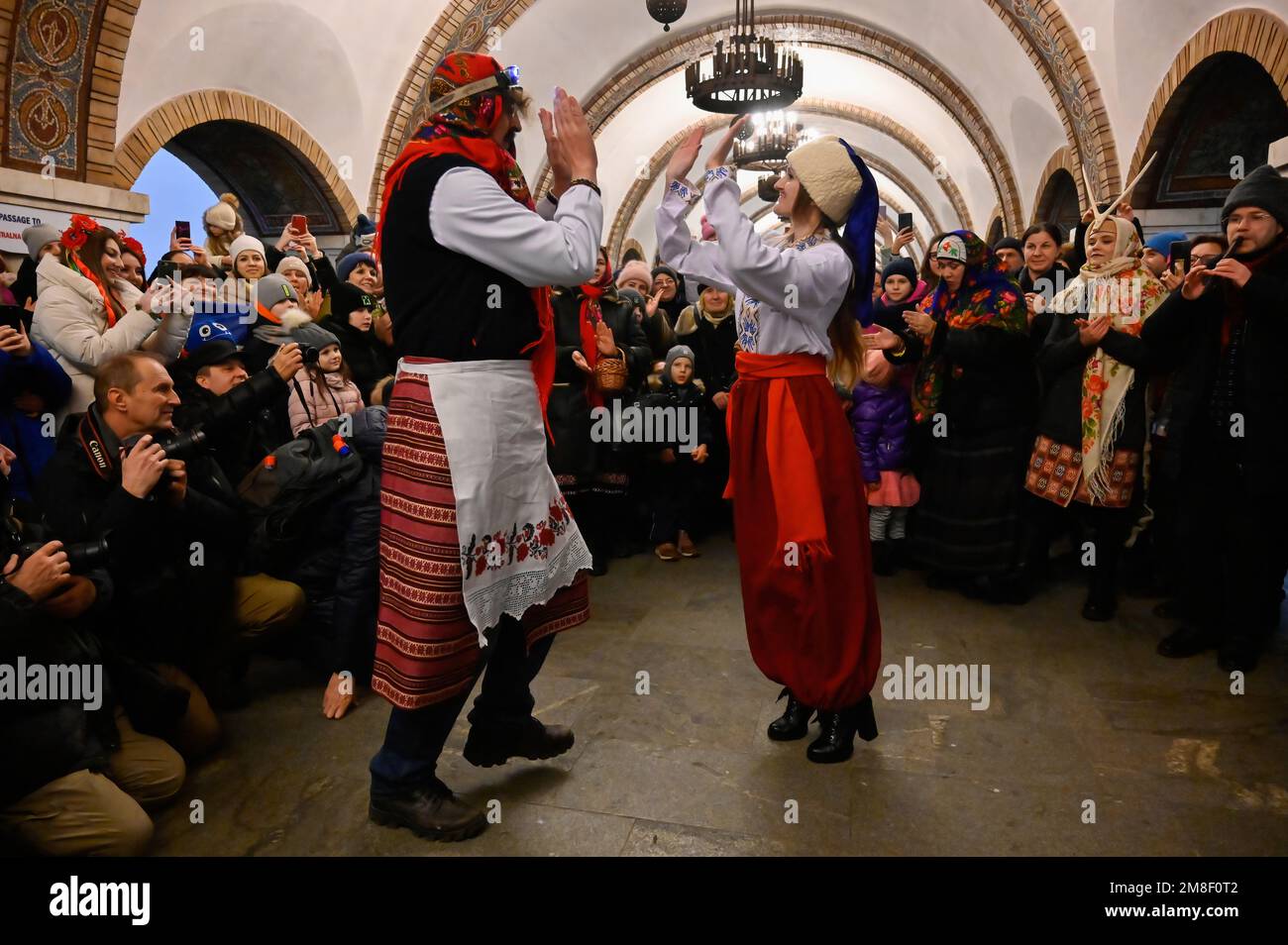 Ukrainians dressed in folk costumes celebrate the folk holiday Malanka ...